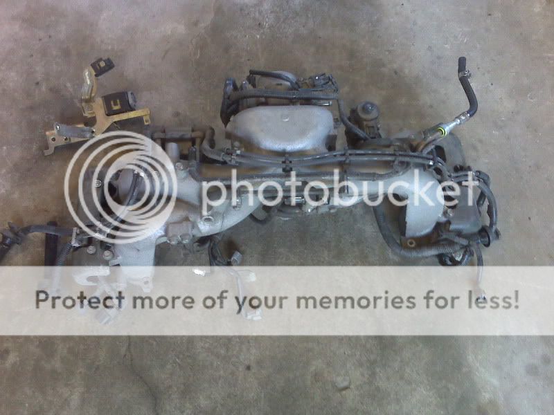 06 tgvless long runner 2.5i manifold on sti avcs heads - NASIOC